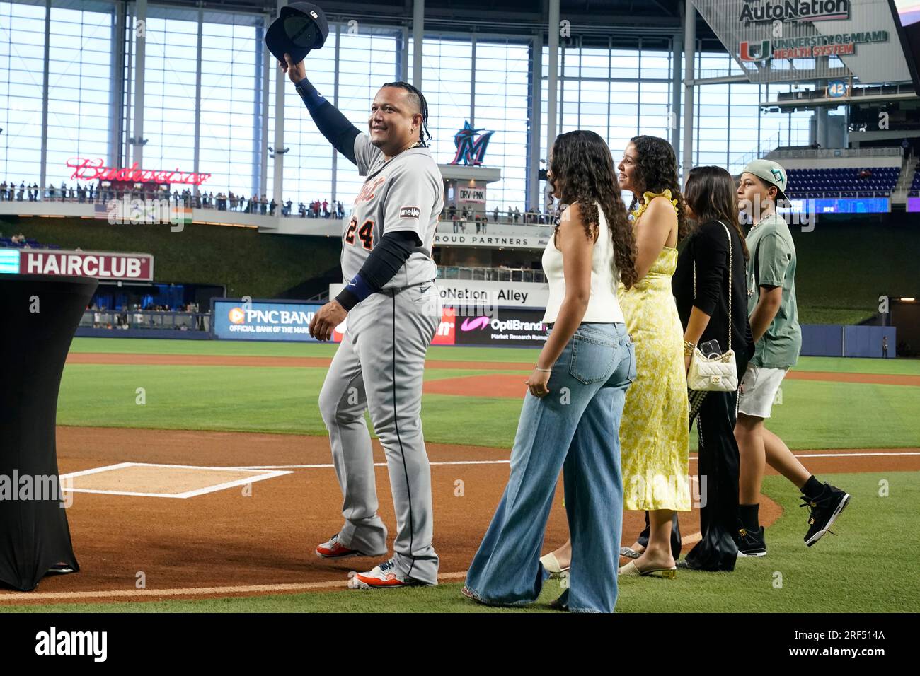Detroit Tigers' Miguel Cabrera (24) and his family enter the field ...