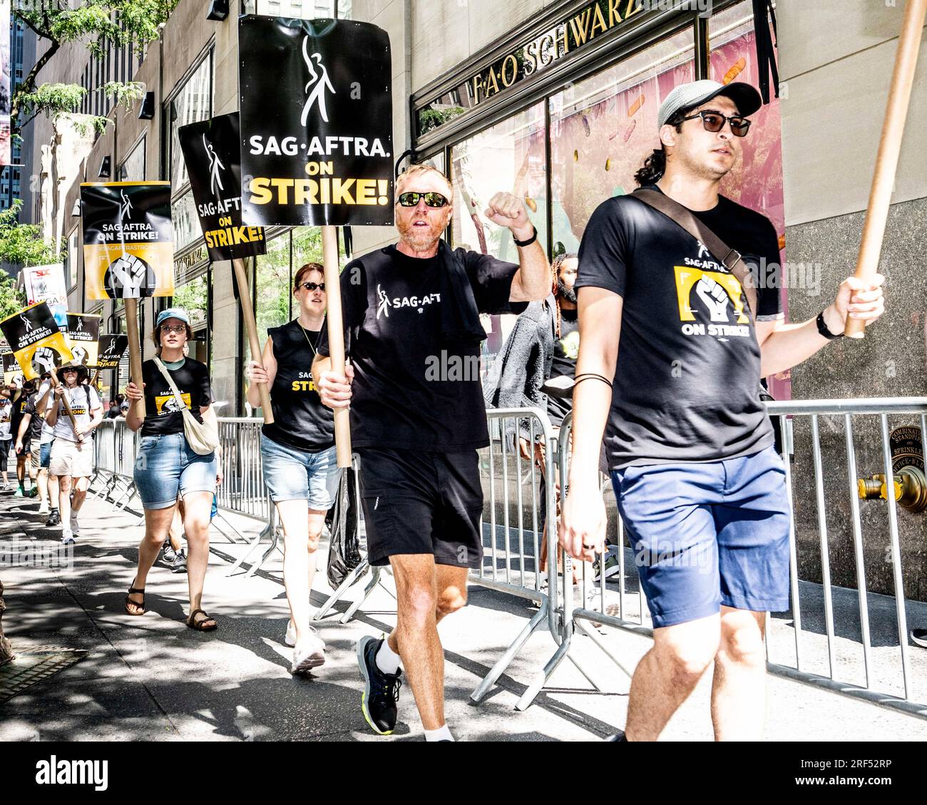 July 31, 2023, New York City, New York, United States: People carrying ...