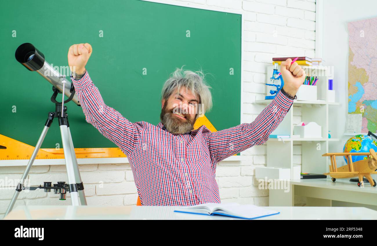Excited teacher at workplace. Teachers day. Happy bearded professor at ...