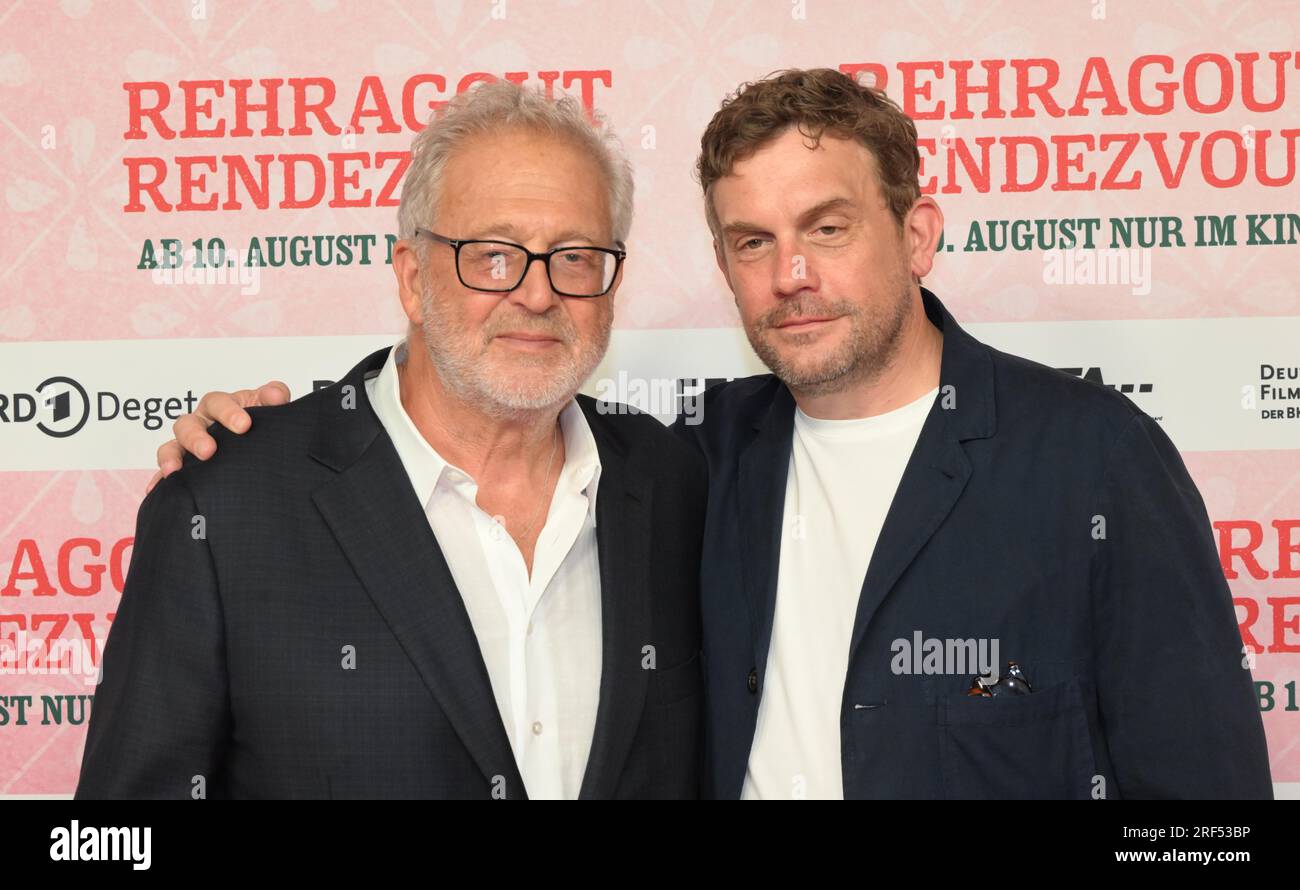 Munich, Germany. 31st July, 2023. Producer Martin Moszkowicz (l) and ...