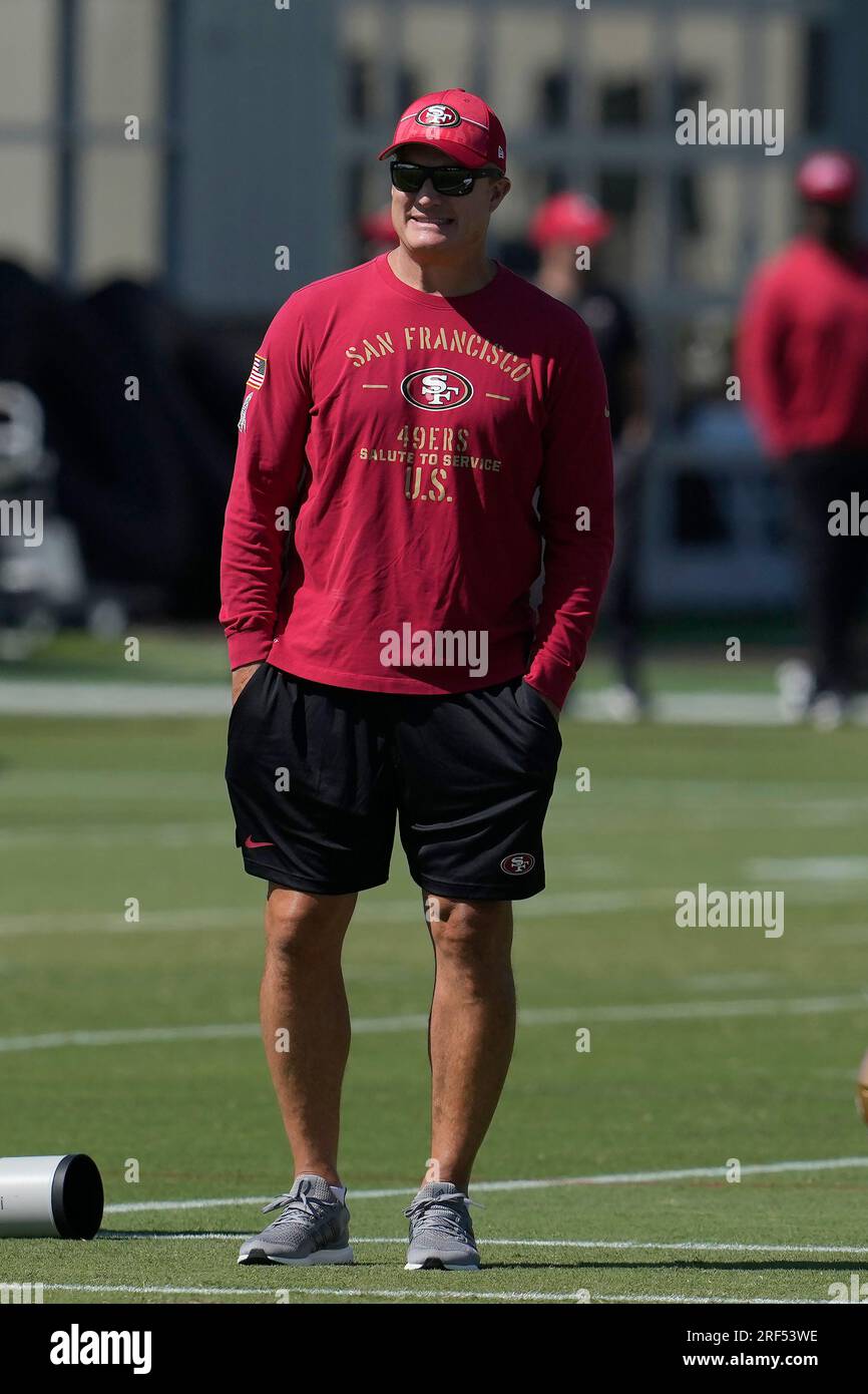 San Francisco 49ers general manager John Lynch watches as players take ...