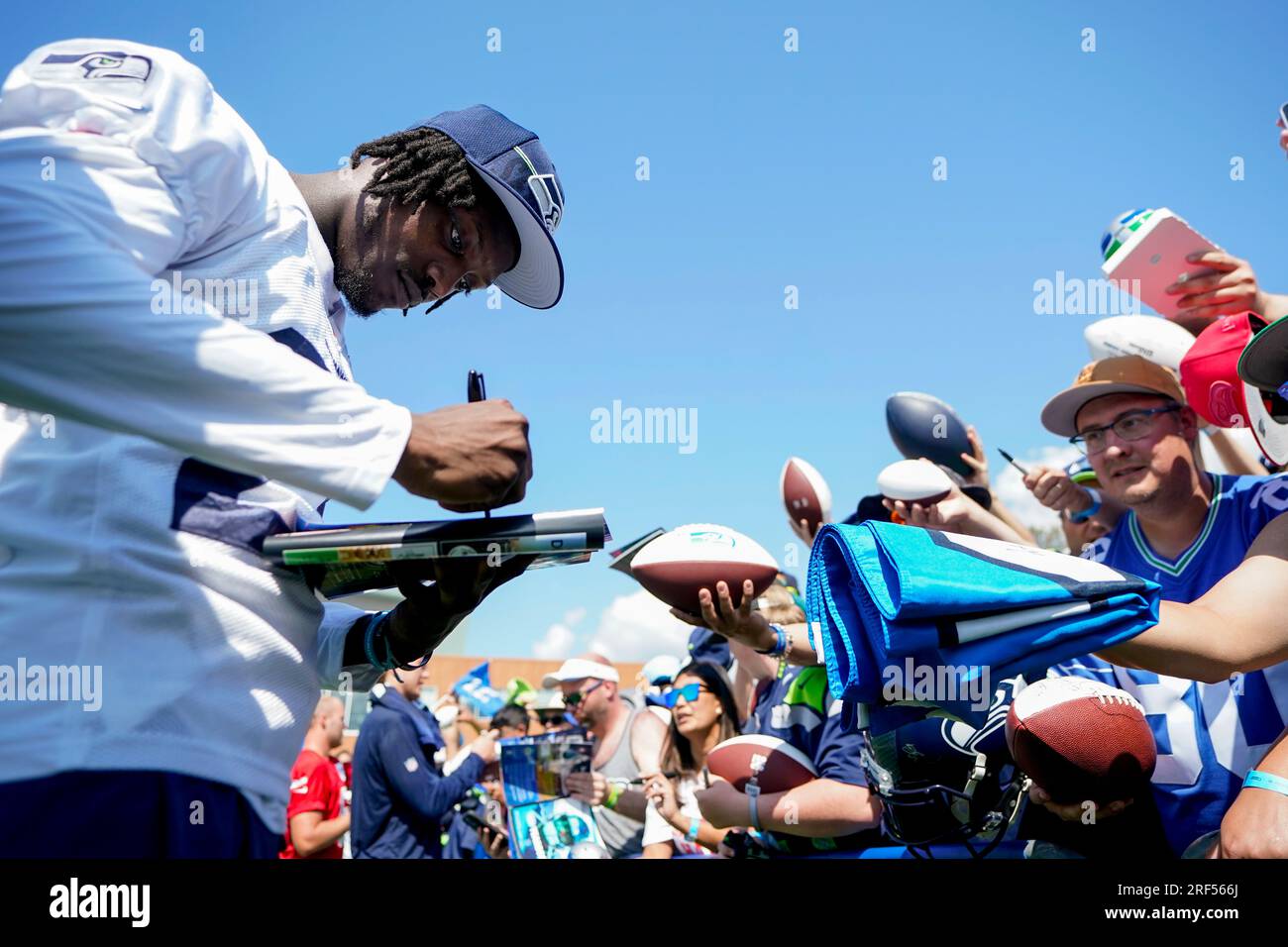 Seattle Seahawks cornerback Riq Woolen signs autographs for fans during ...