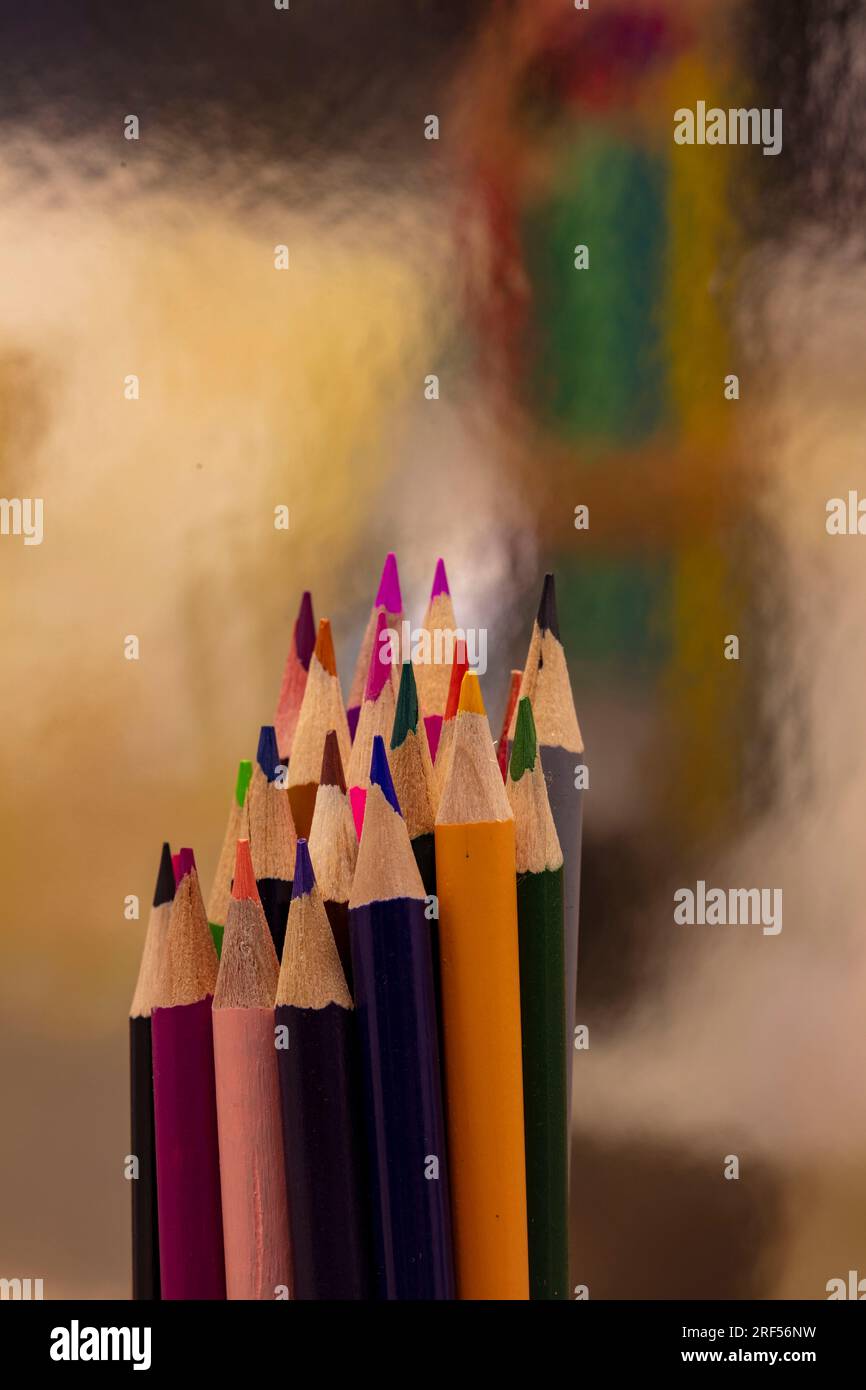 Dynamic close up still life of coloured pencils Stock Photo - Alamy