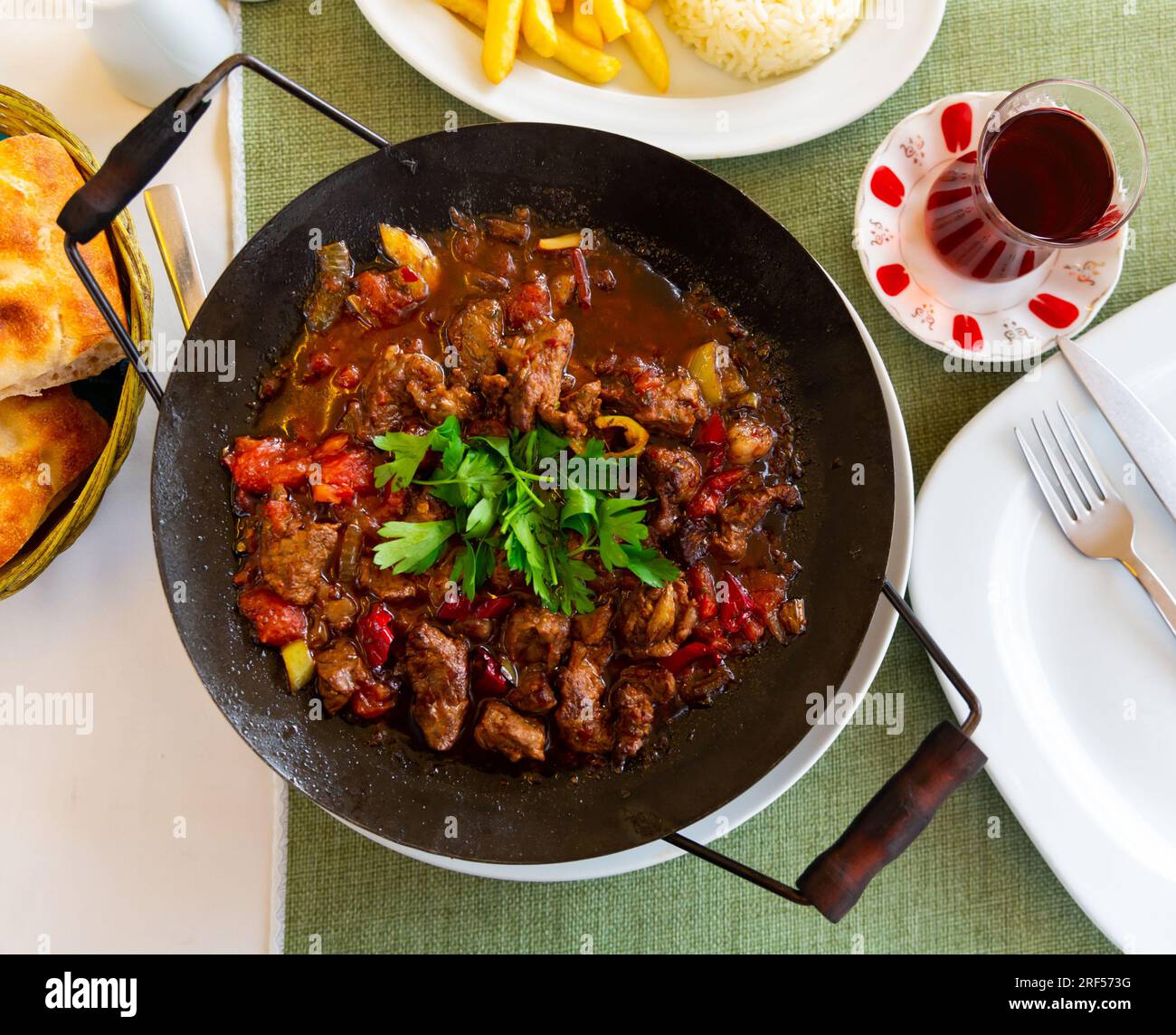 Traditional meat dish of Turkish cuisine is Sac Kavurma Stock Photo - Alamy