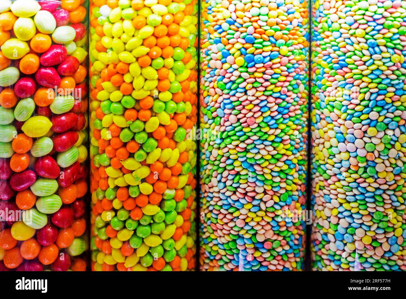 jelly and marmeshow sweets in glass containers. Buying by weight in a ...