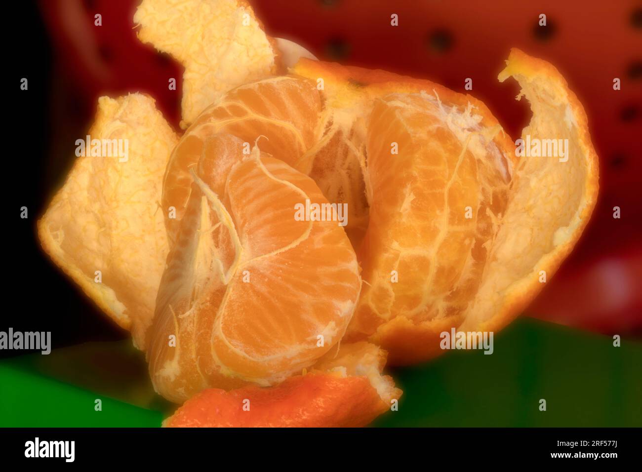Very close up food still life of juicy tangerine pegs Stock Photo - Alamy