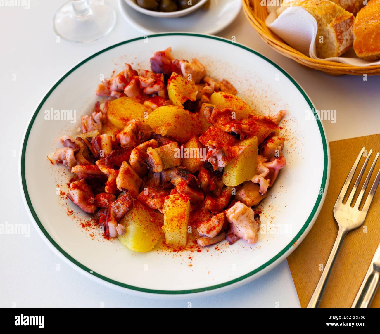 Galician style octopus served hi-res stock photography and images - Alamy