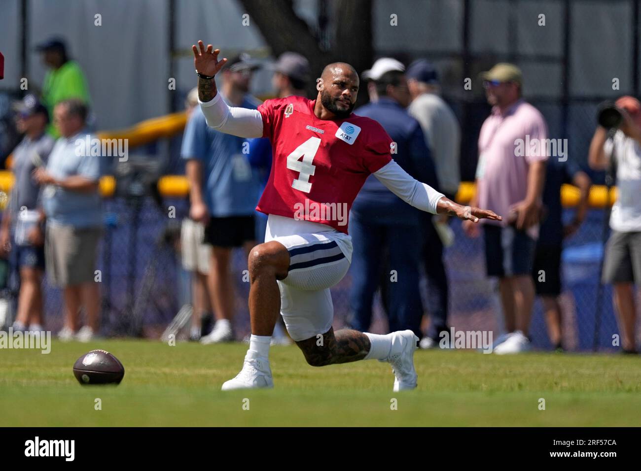 Dallas Cowboys quarterback Dak Prescott stretches during the NFL ...