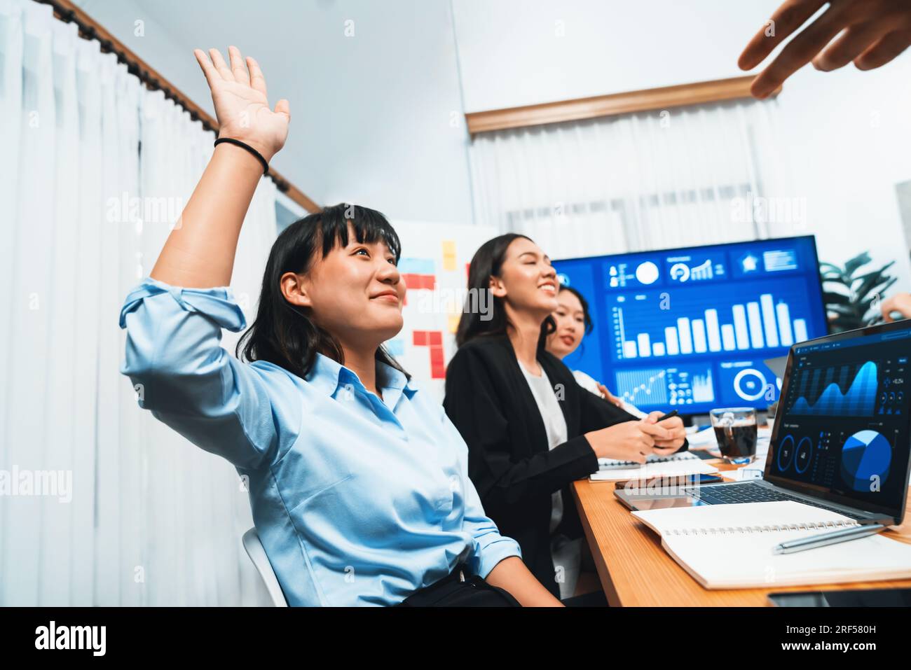 Diverse ethnic group of analyst team actively engage in business ...