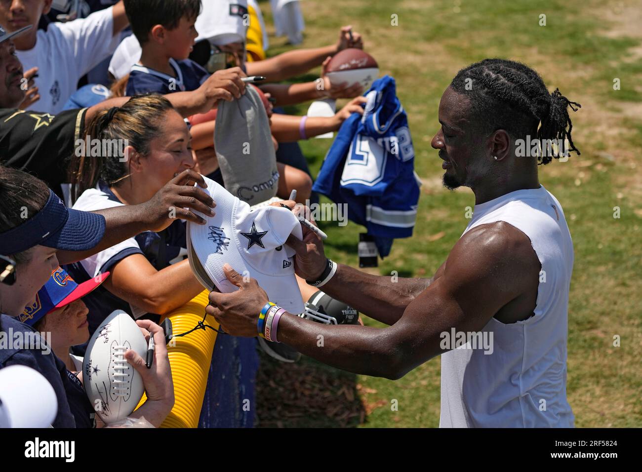 Dallas Cowboys linebacker Micah Parsons signs autographs during the NFL ...