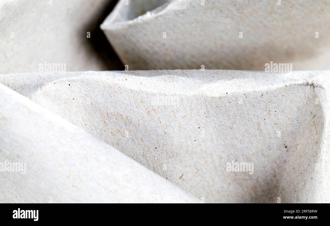 crumpled light dense cardboard, an uneven surface made of cardboard ...