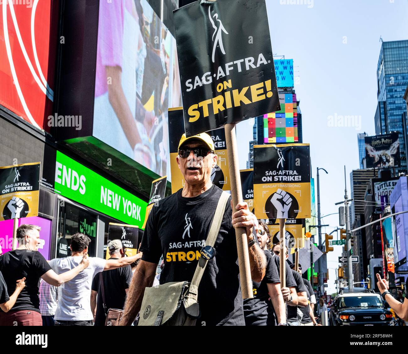 New York City, United States. 31st July, 2023. A protester carries a ...