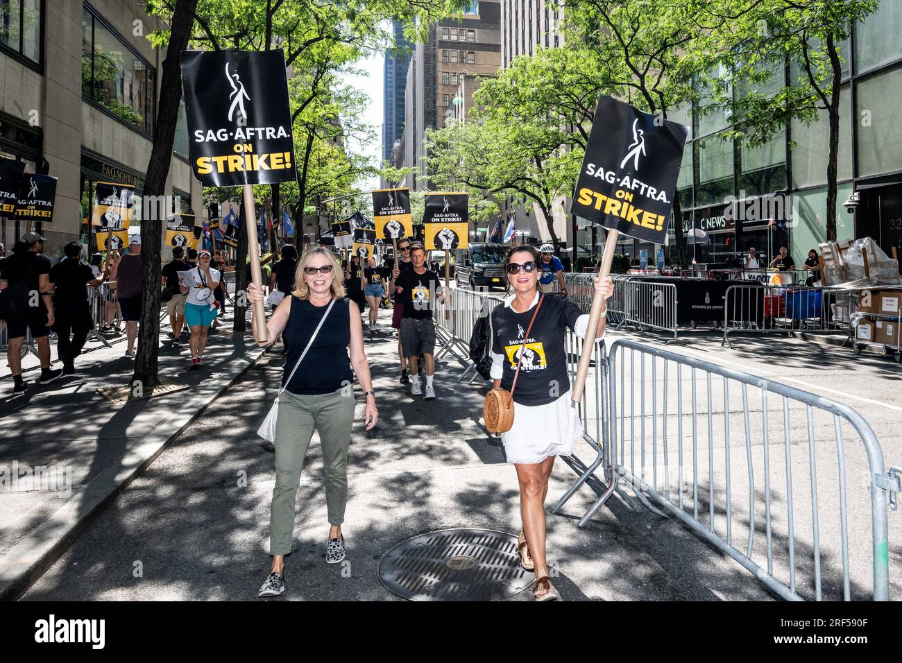 New York City, United States. 31st July, 2023. Protesters carry ...
