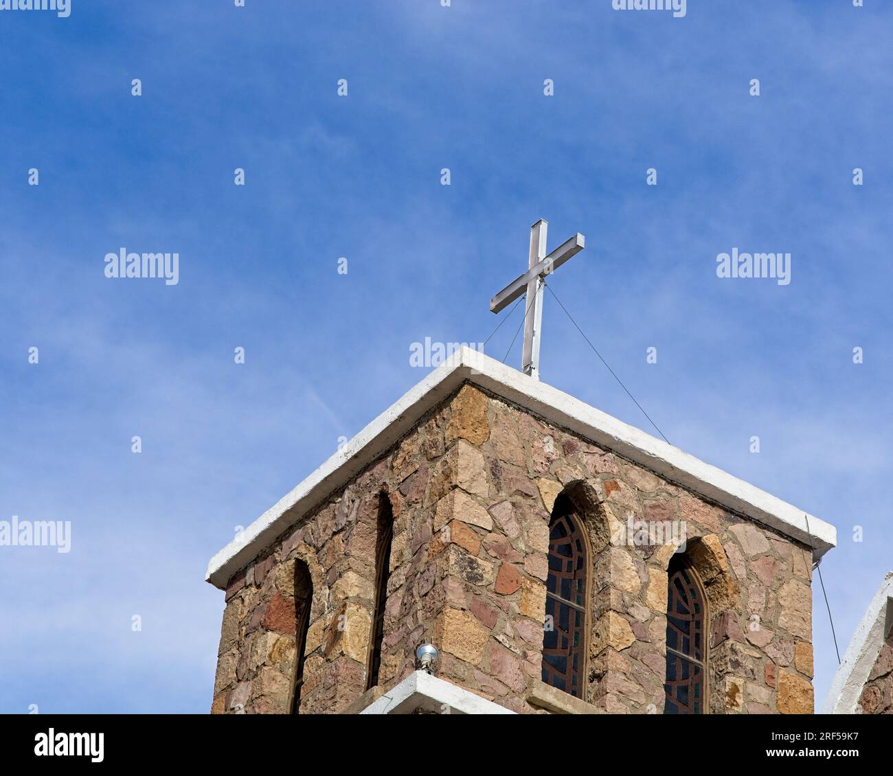 Stone tower of 19th century Our Lady of Peace Catholic Church with ...