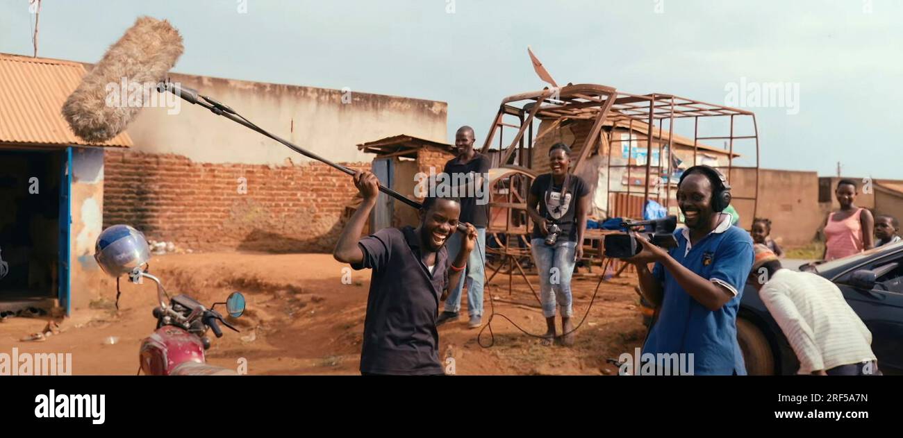 ONCE UPON A TIME IN UGANDA, right, headphones: Nabwana I.G.G. (Nabwana ...