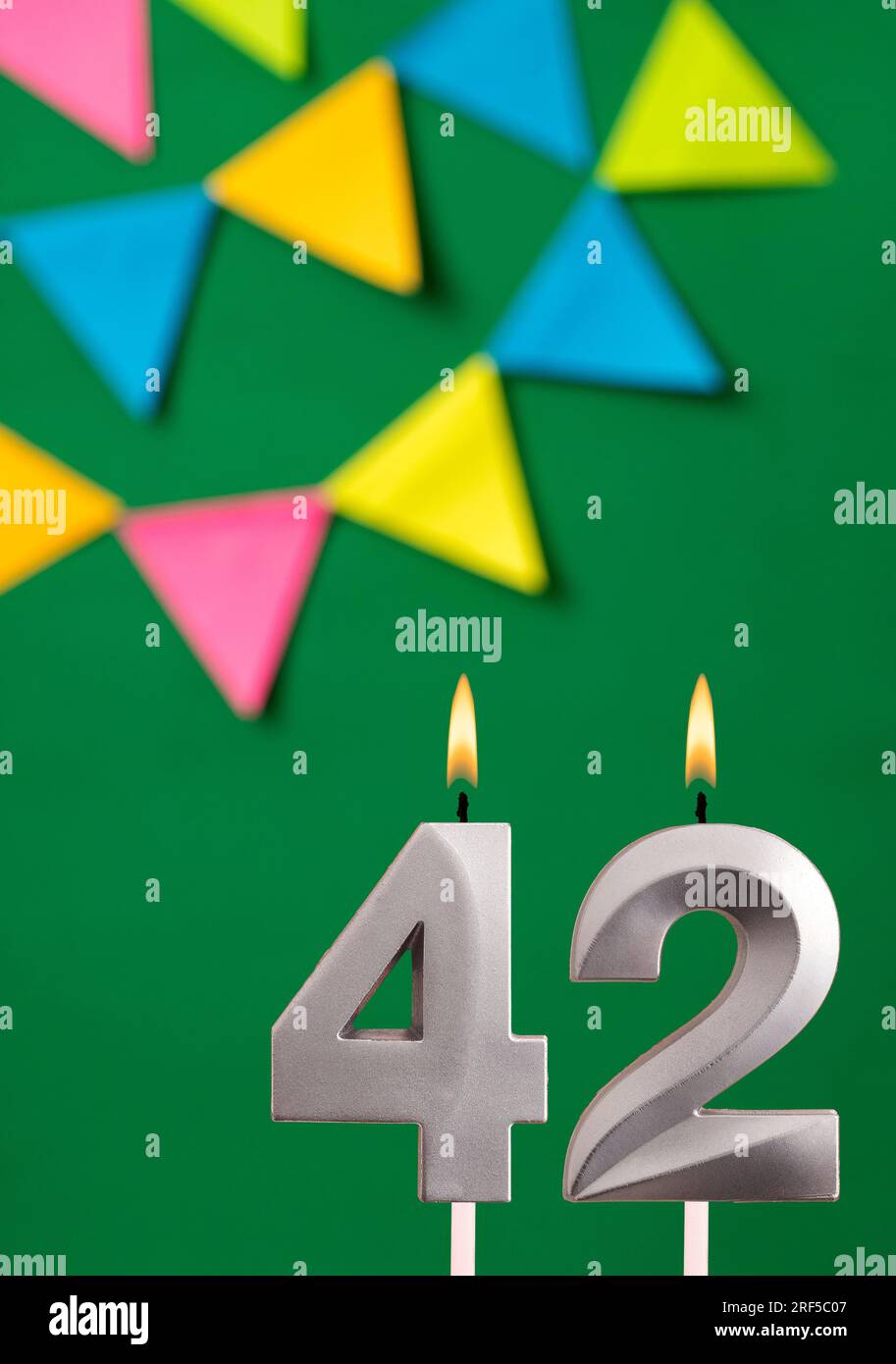 Vertical birthday card with number 42 candle - Green background with ...