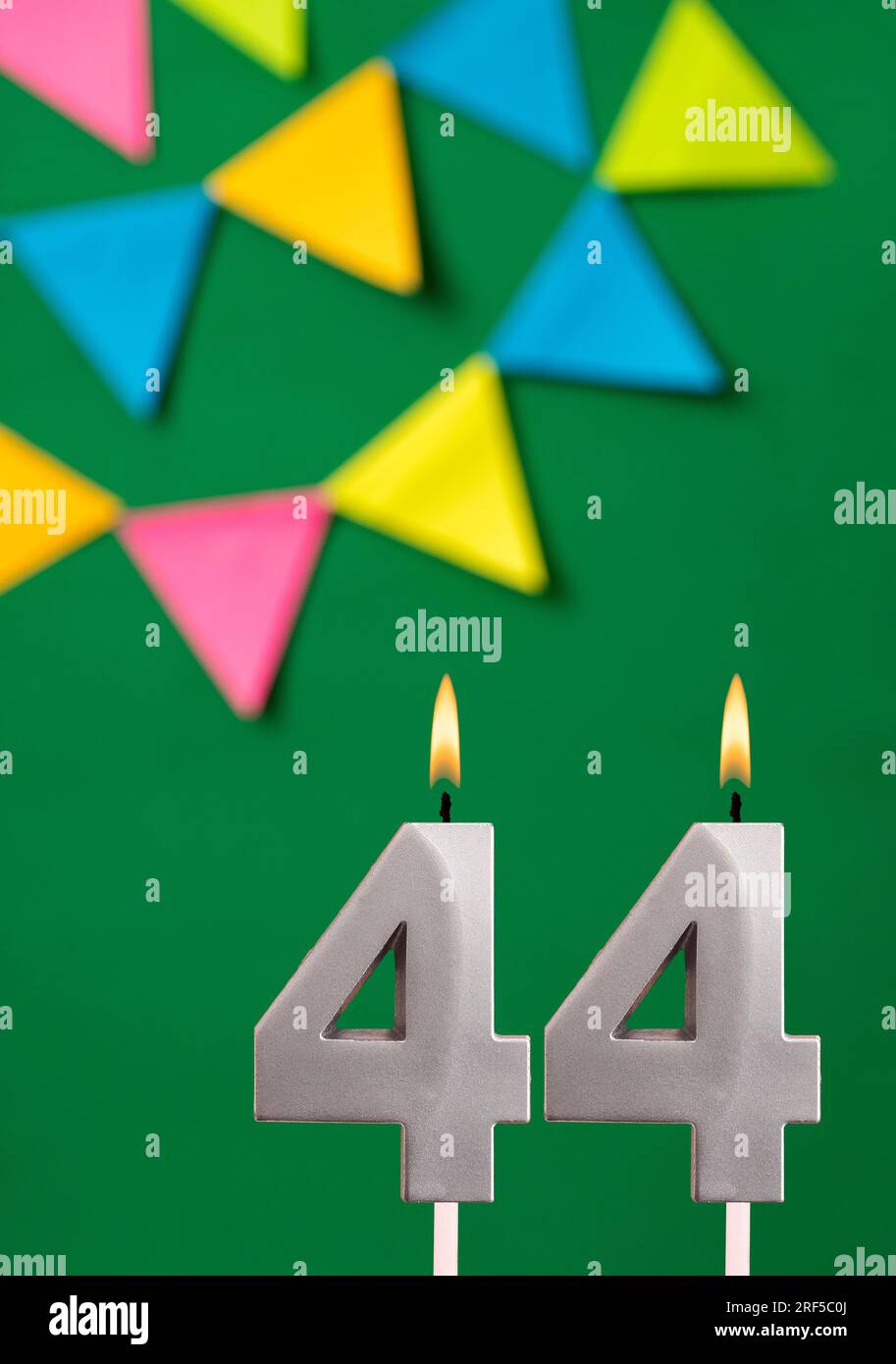 Vertical birthday card with number 44 candle - Green background with ...