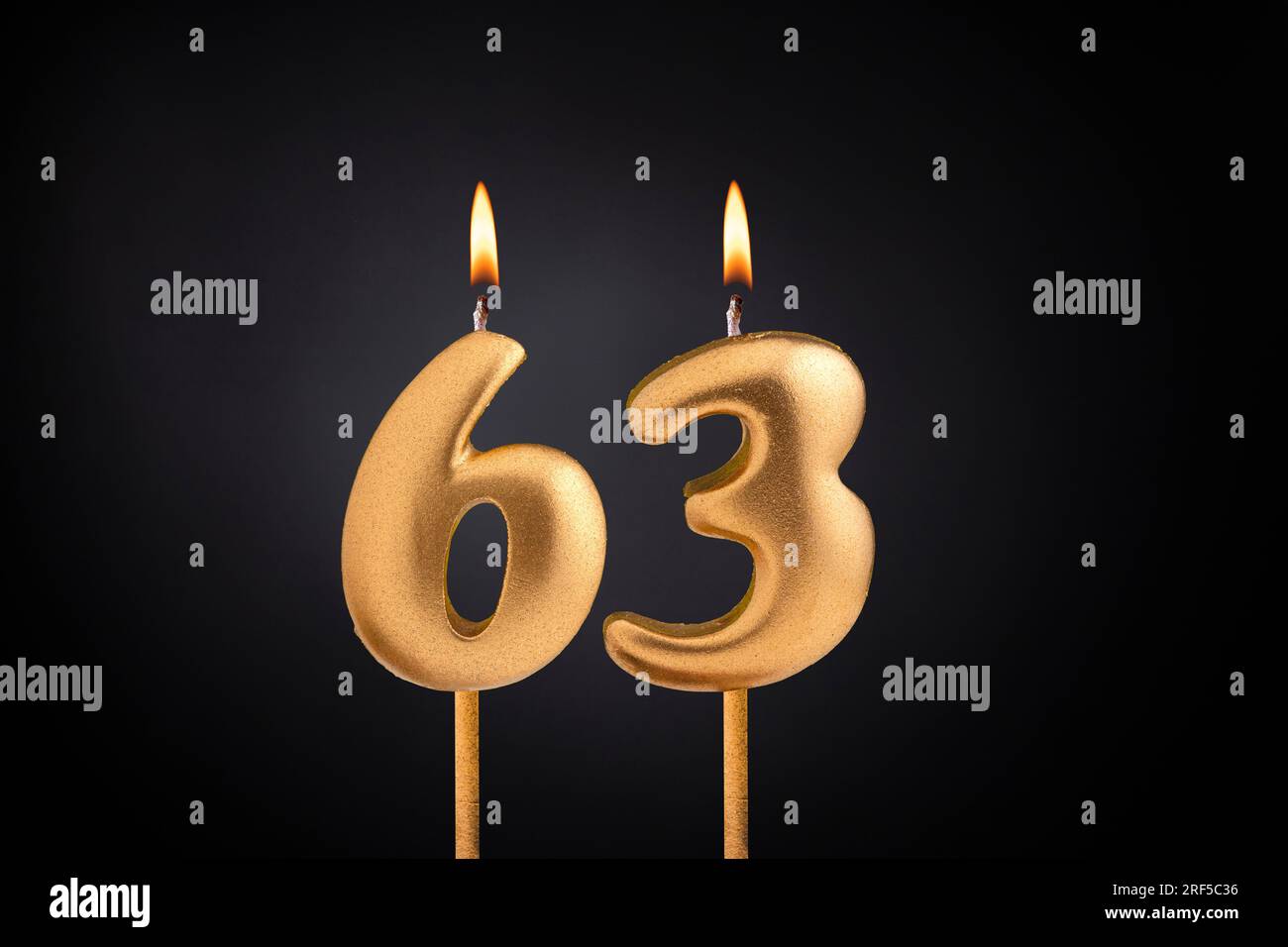 Golden candle 63 with flame - Birthday card on dark luxury background ...