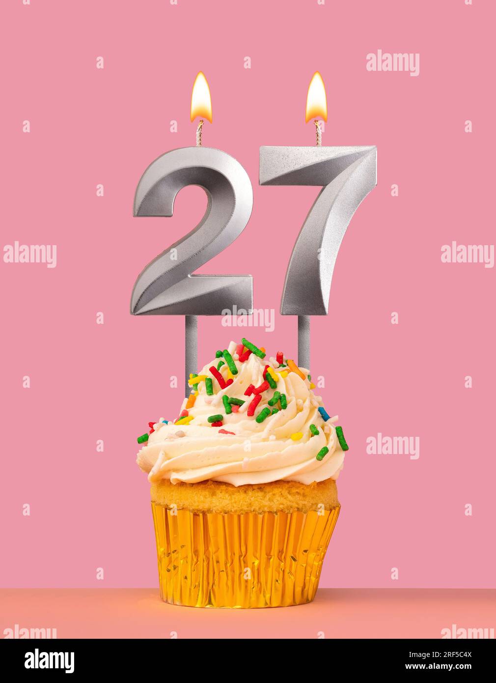 Birthday card with cupcake and candle number 27 Stock Photo - Alamy