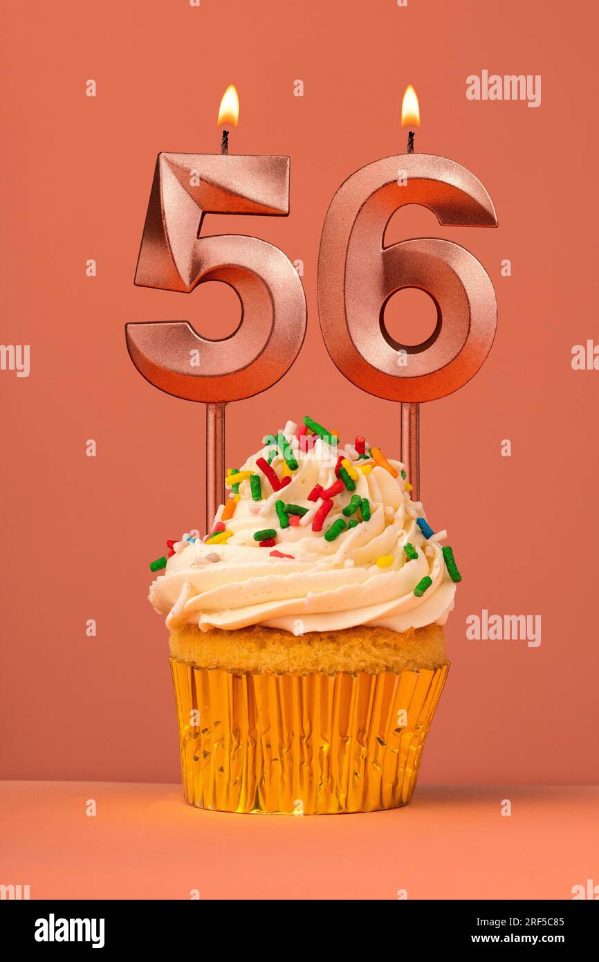 Candle number 56 - Cake birthday in coral fusion background Stock Photo ...