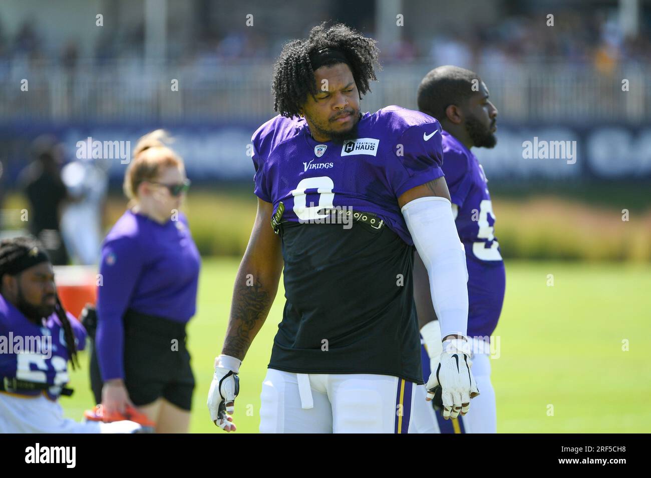 Minnesota Vikings linebacker Marcus Davenport walks onto the practice ...