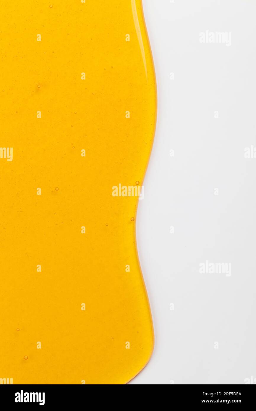 beautiful background of thick and sweet honey with air bubbles, close ...