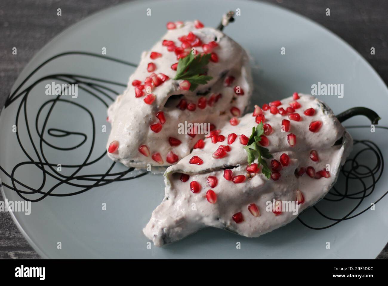 Close-up chiles rellenos en nogada, traditional Mexican gourmet food ...
