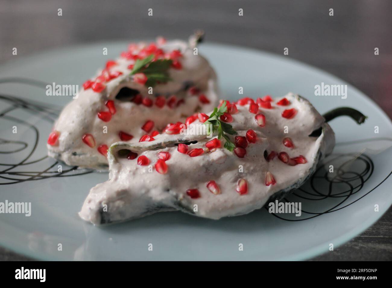 Close-up chiles rellenos en nogada, traditional Mexican gourmet food ...