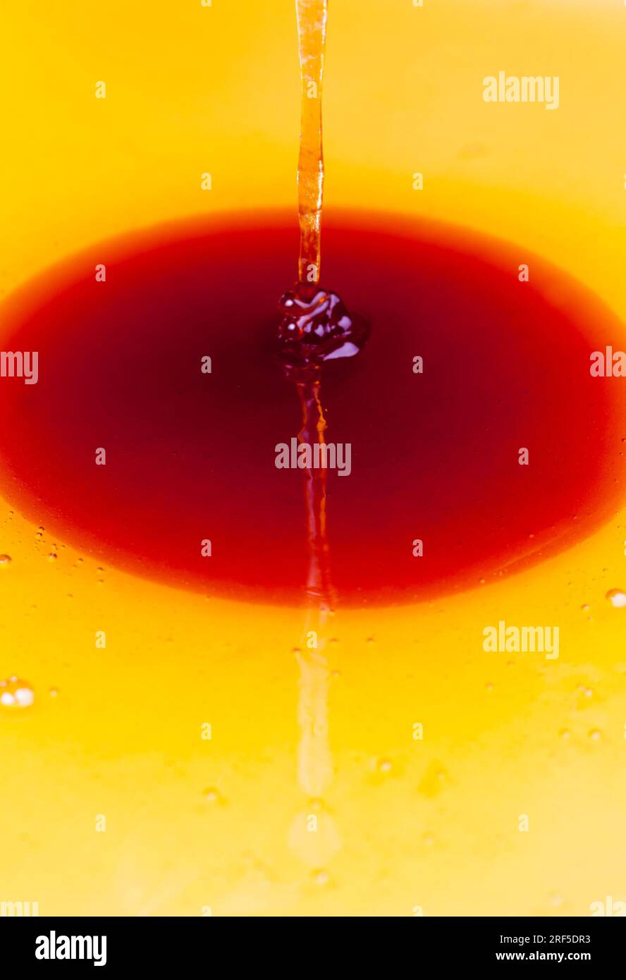 thick and sweet honey mixed from different types of honey of different ...