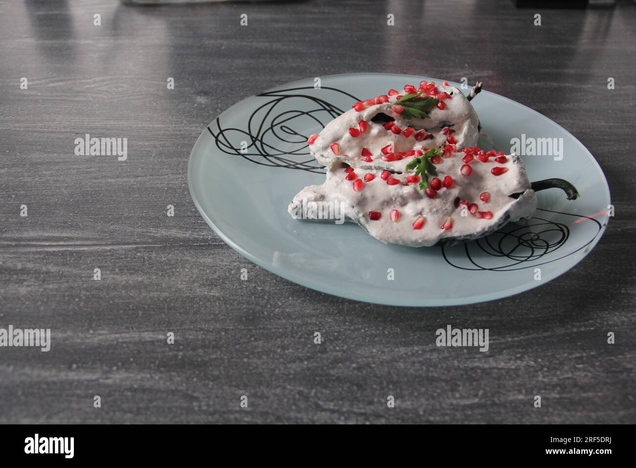 Close-up chiles rellenos en nogada, traditional Mexican gourmet food ...