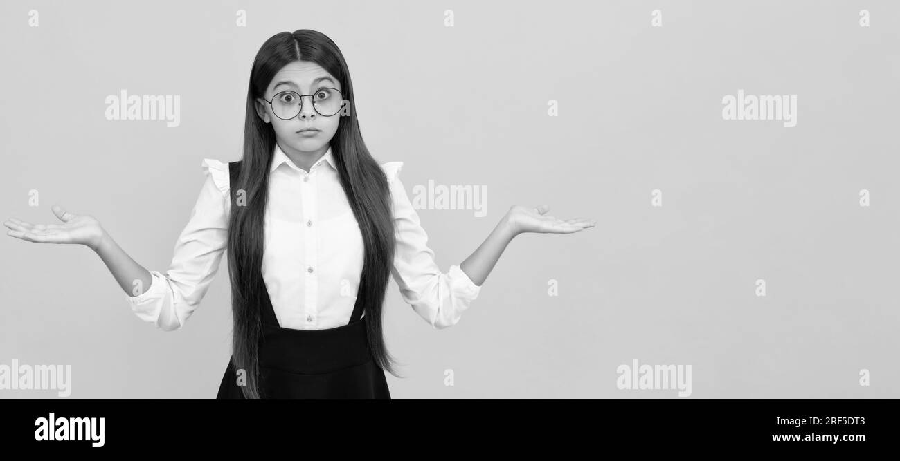 confused child long hair look like nerd. smart kid. girl look through ...