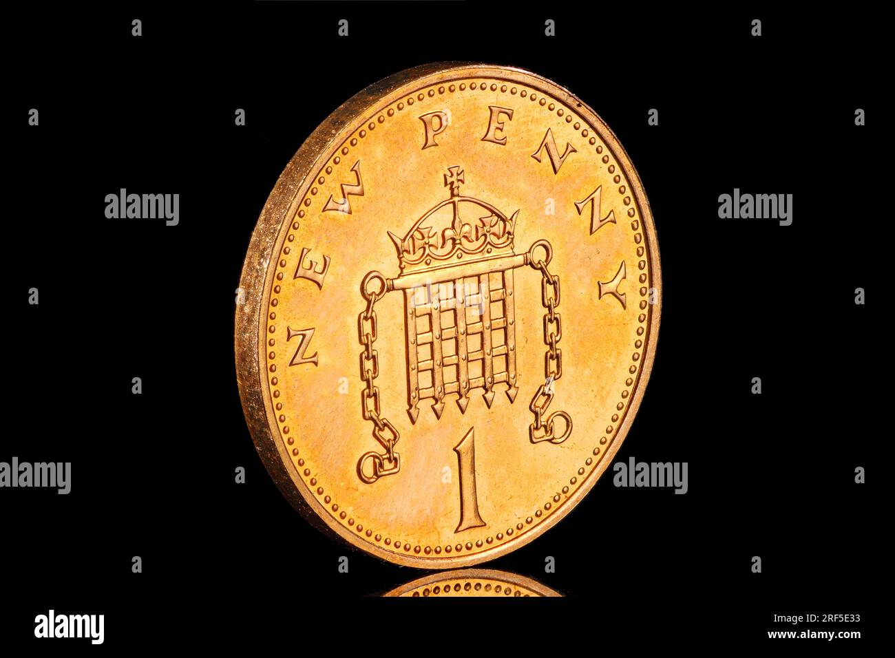 United Kingdom One Pence coin showing a Crowned Porticulis and Chains ...