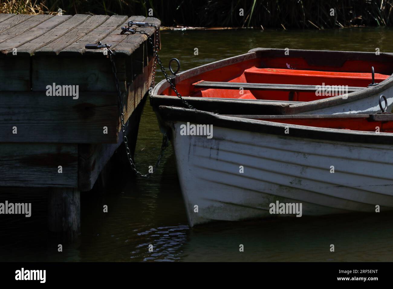 Red rowboats hi-res stock photography and images - Alamy
