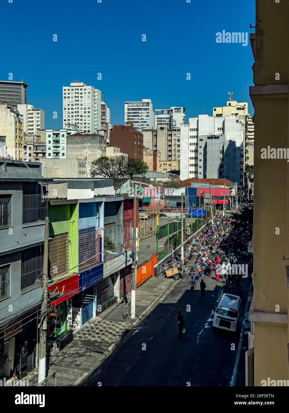 A group of people smoke crack in a central area, occupied by drug users ...