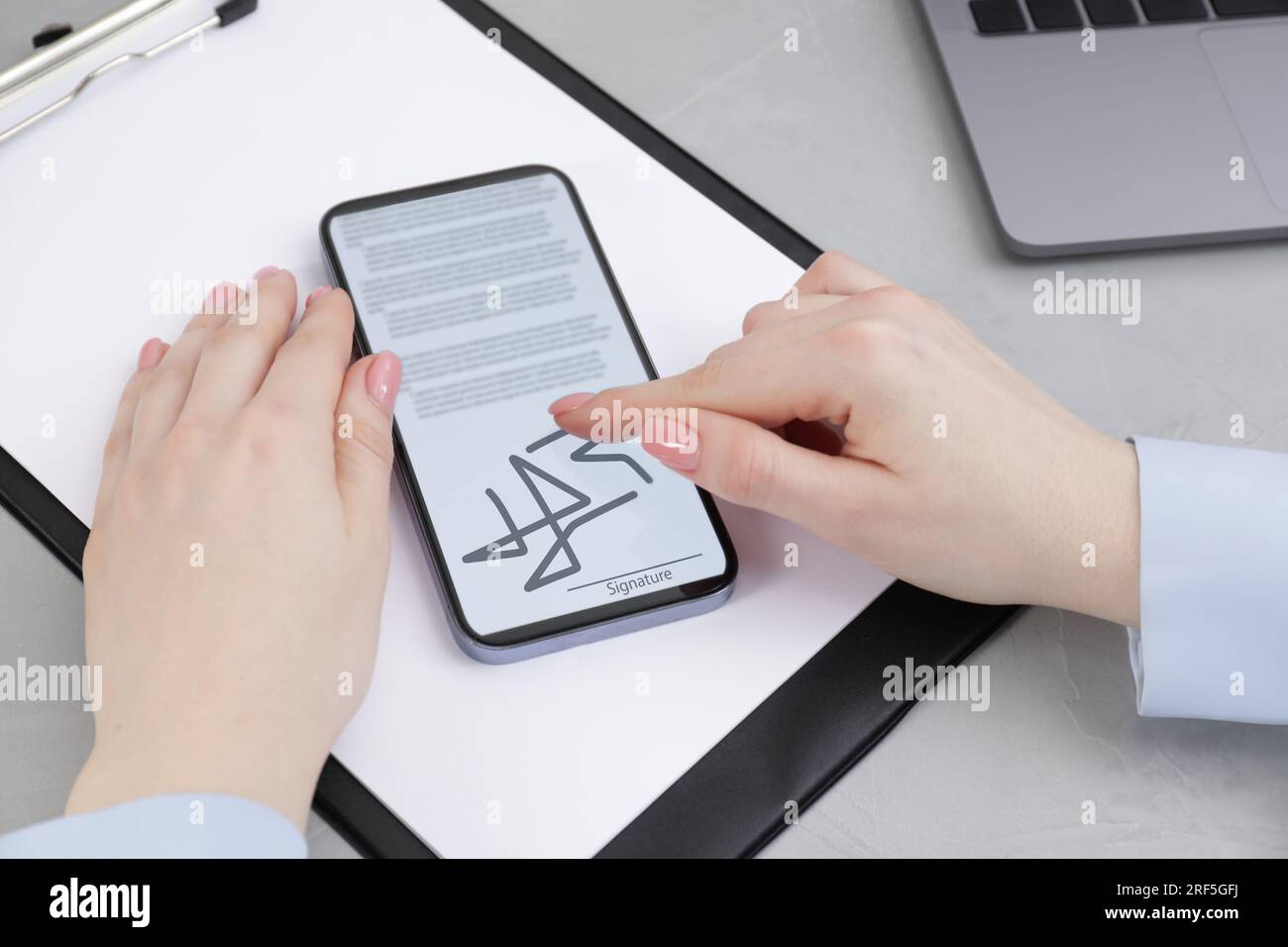Using touch pad signature hi-res stock photography and images - Alamy