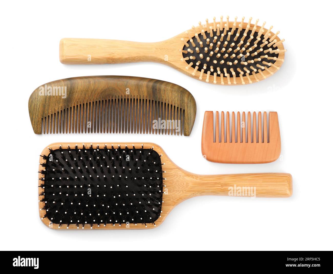 Set of hair brushes and combs isolated on white, top view Stock Photo ...