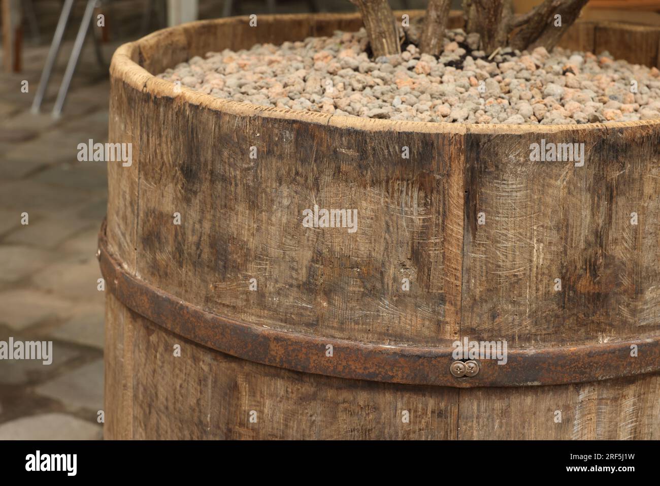 Traditional wooden barrel with gravel outdoors, closeup Stock Photo - Alamy