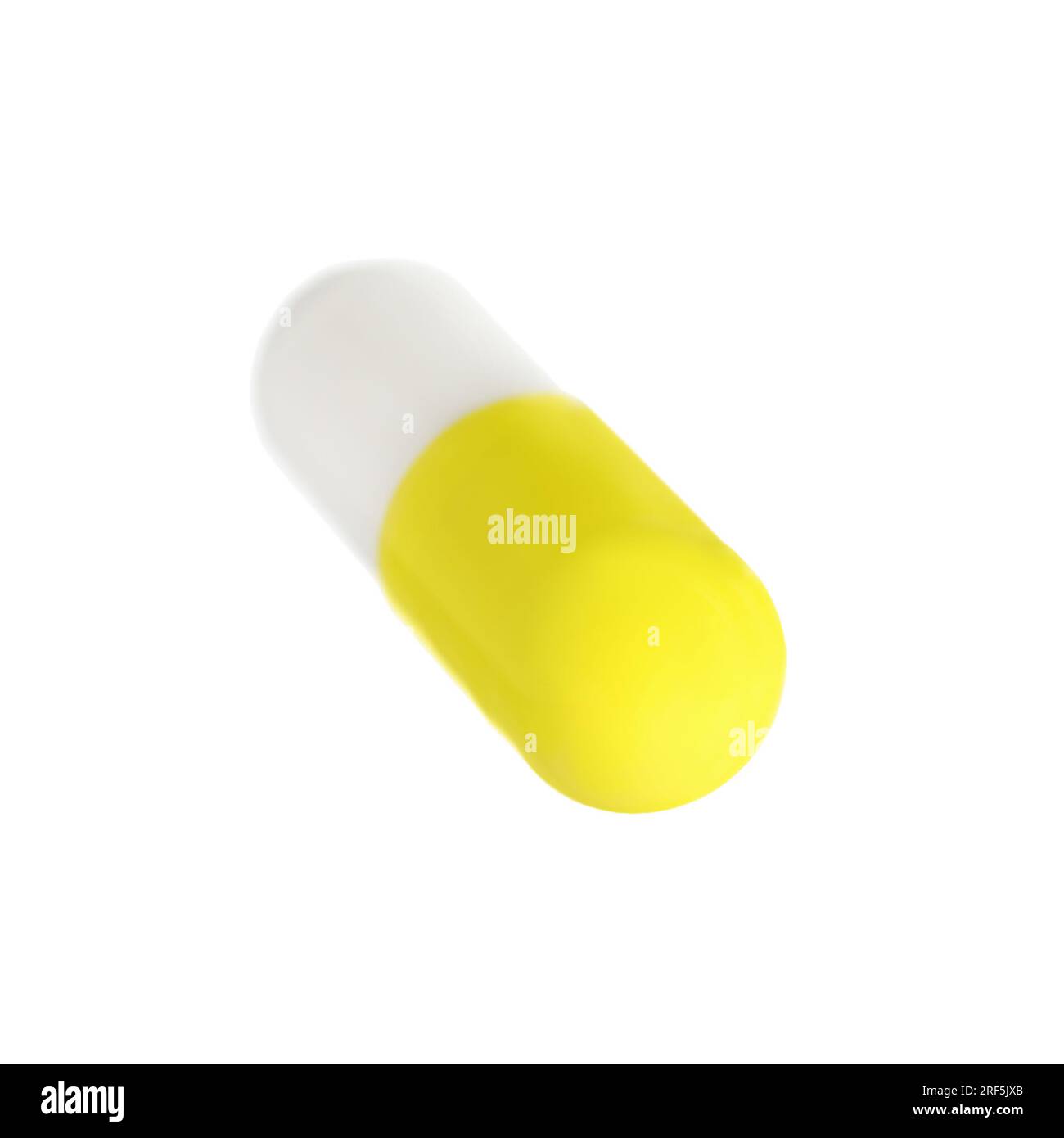 One pill isolated on white. Medicinal treatment Stock Photo - Alamy
