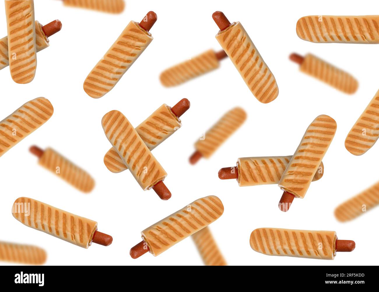 Many yummy French hot dogs with grilled buns falling on white ...