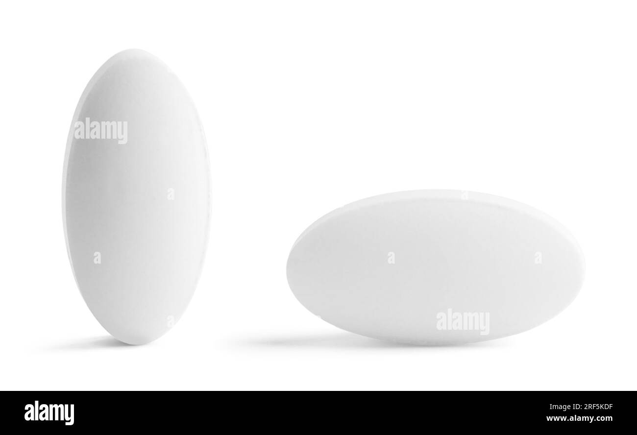 Pill in different positions isolated on white Stock Photo - Alamy