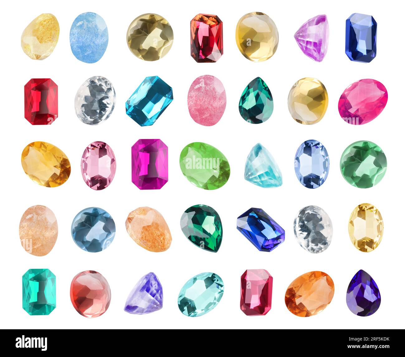 Set of different shiny gemstones for jeweler isolated on white Stock ...