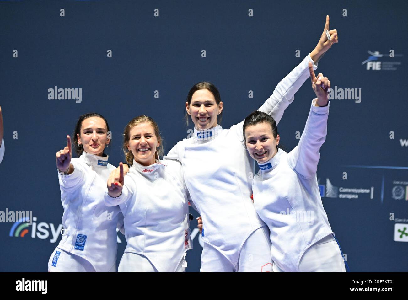 Players of Poland celebrate winning a during the 2023 FIE Fencing World ...
