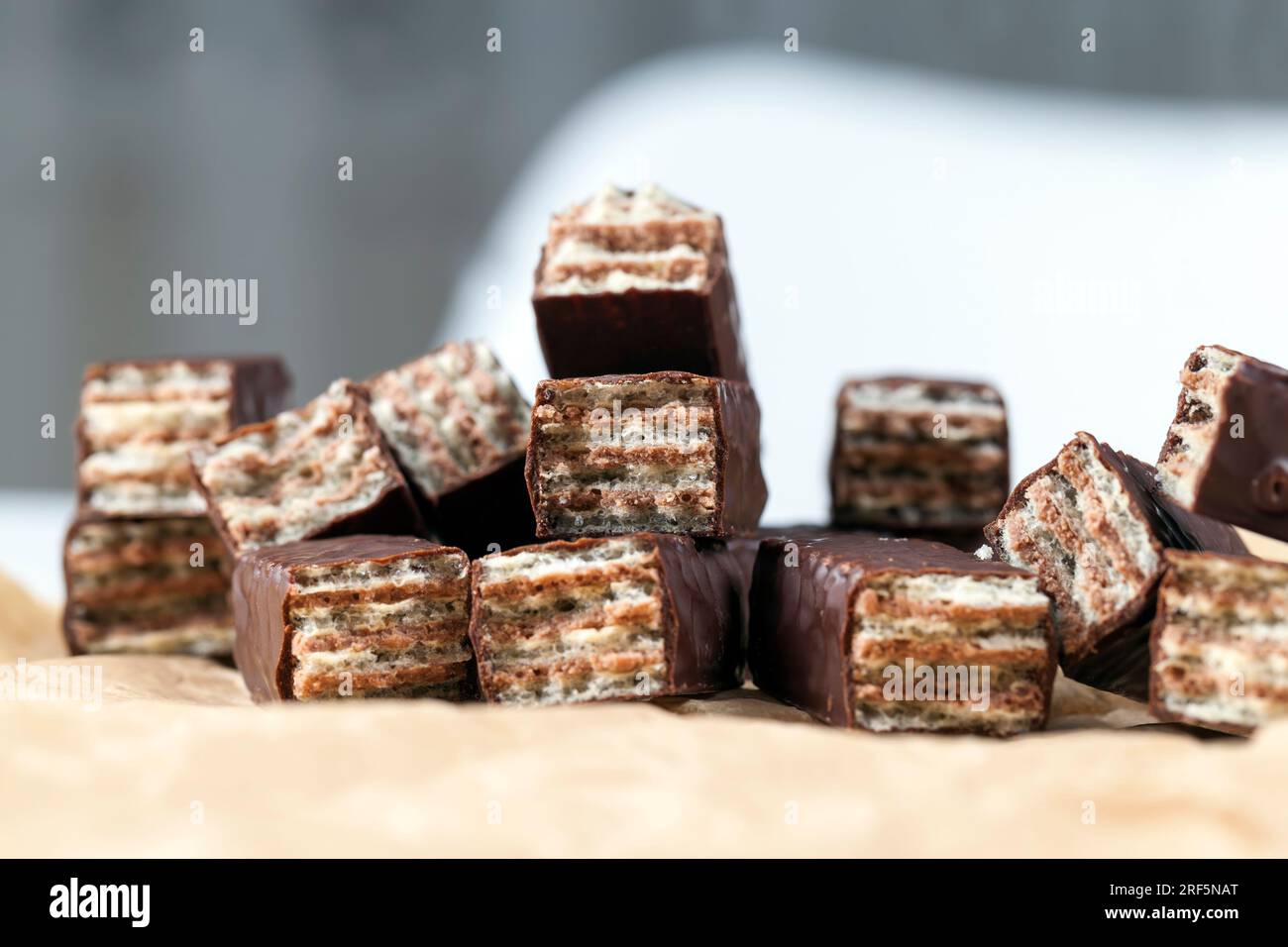 cocoa candies with waffles, close up of chocolates and crunchy flour ...