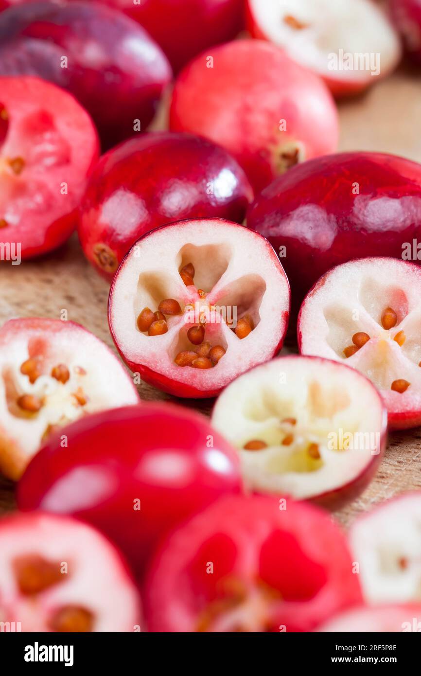 red cut sour useful cranberries, red ripe divided cranberries on the ...