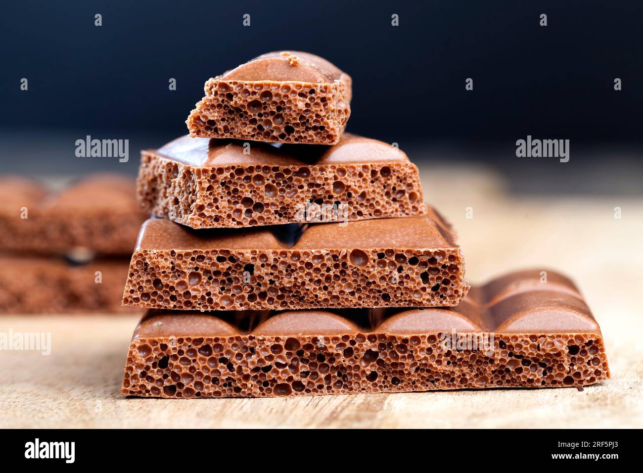 divided into pieces chocolate bar, air milk chocolate broken into ...