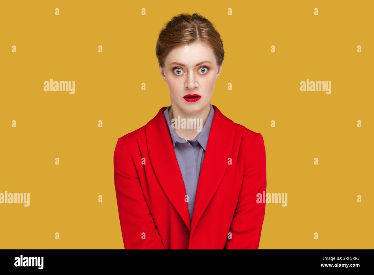 Portrait of shocked scared frighten woman with red lips standing ...