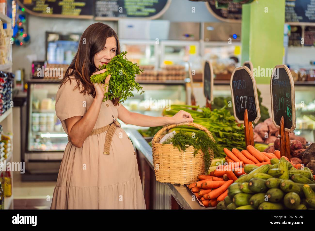 A glowing pregnant woman after forty makes a healthy choice as she ...