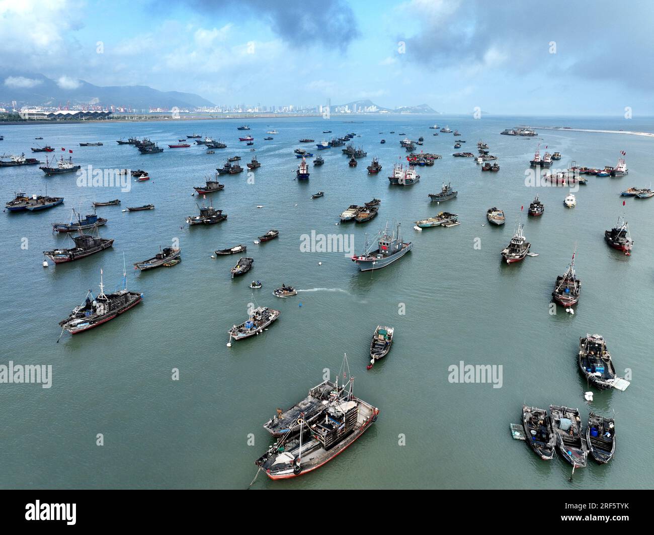LIANYUNGANG, CHINA - AUGUST 1, 2023 - Fishing boats berth to take ...