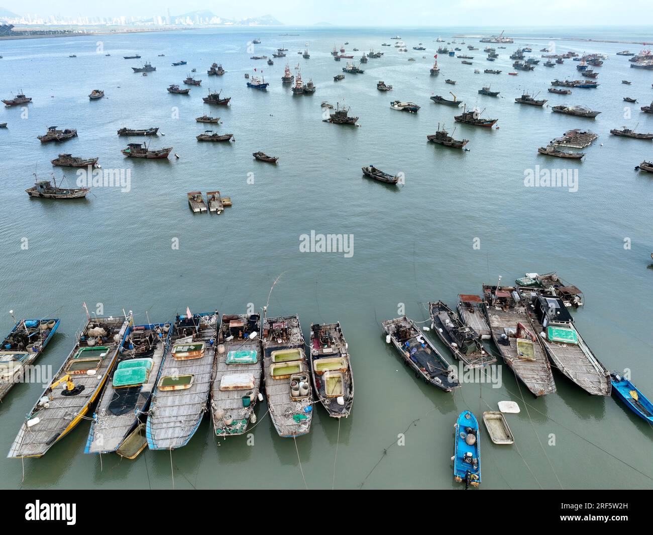 LIANYUNGANG, CHINA - AUGUST 1, 2023 - Fishing boats berth to take ...