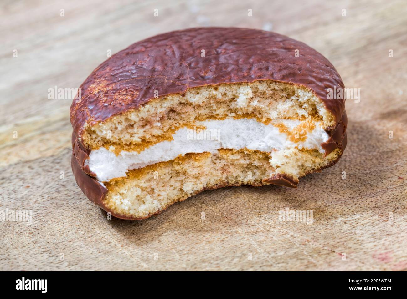 bitten cookie sweetness consisting of two cookies connected by a ...